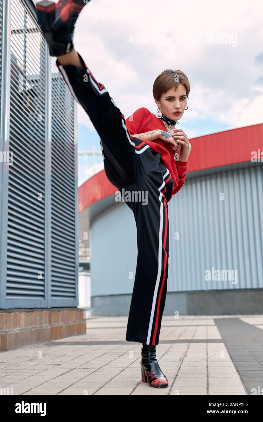 Woman kick leg up hi-res stock photography and images - Alamy