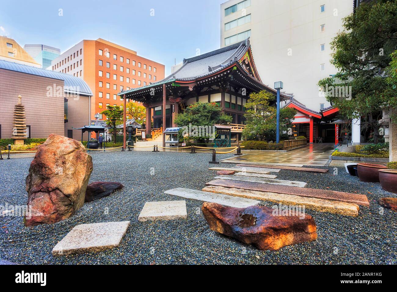 Stone garden around ancient buddhist Taiyu-ji Temple in Osaka downtown ...