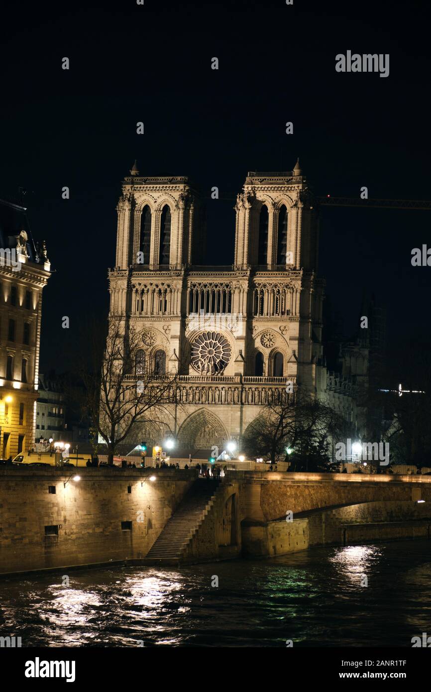 West- Side of Notre Dame at Night Stock Photo - Alamy