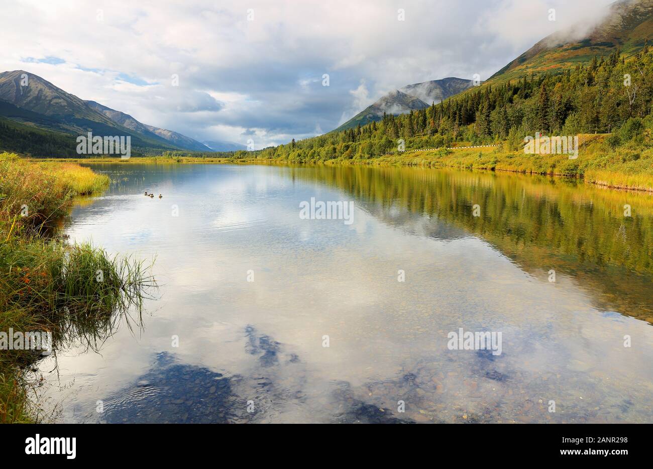 Beautiful sunrise at Kenai River, Alaska, USA. The Kenai River is the ...