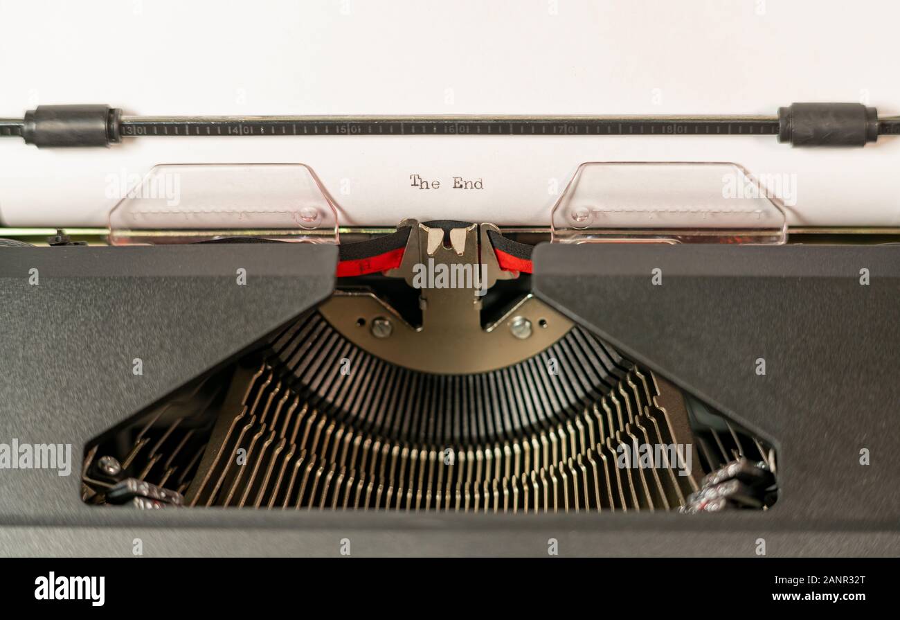 An almost obsolete tool for writing the typewriter here with The End ...