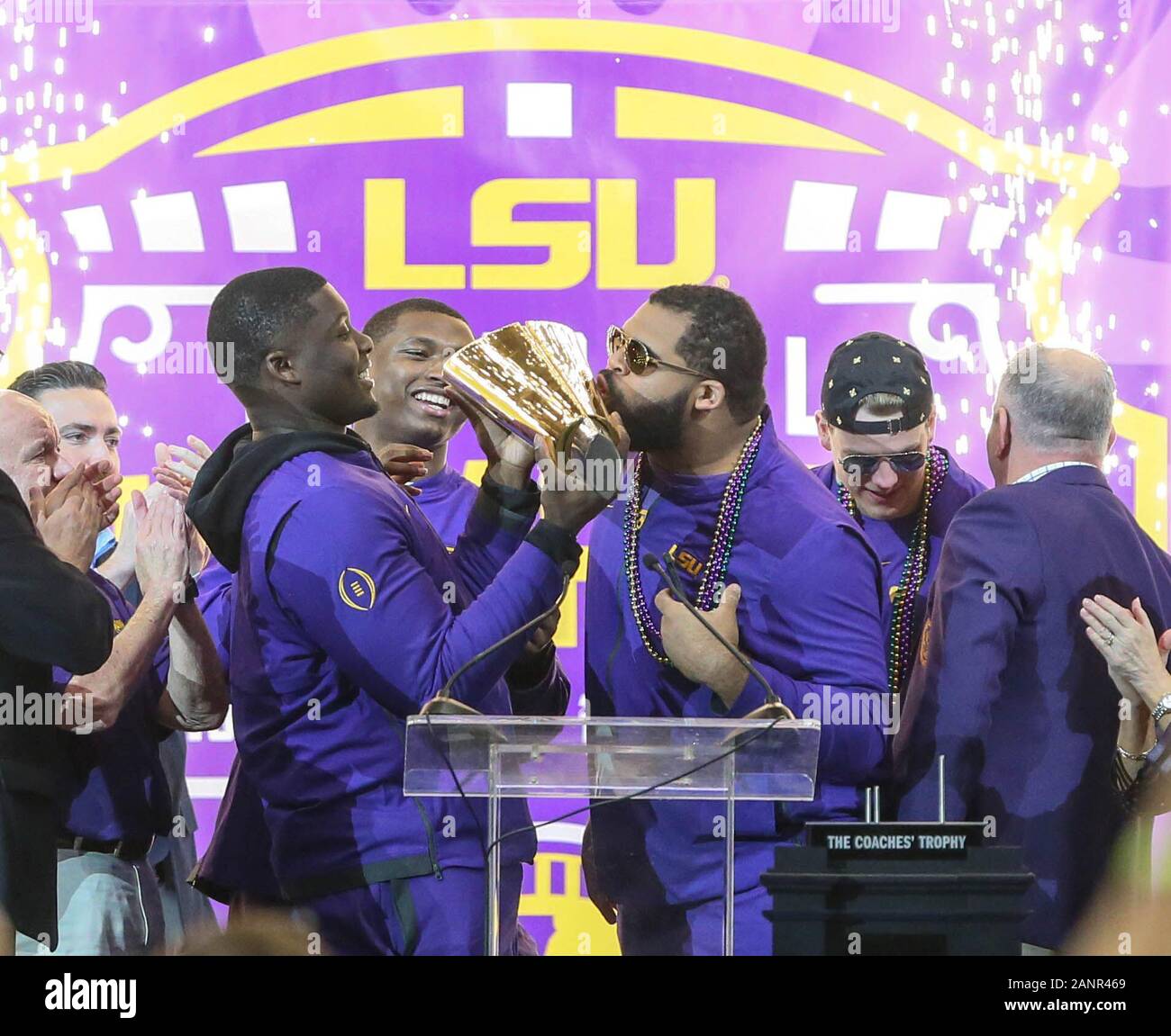 Kisses the trophy in celebration hi-res stock photography and images ...