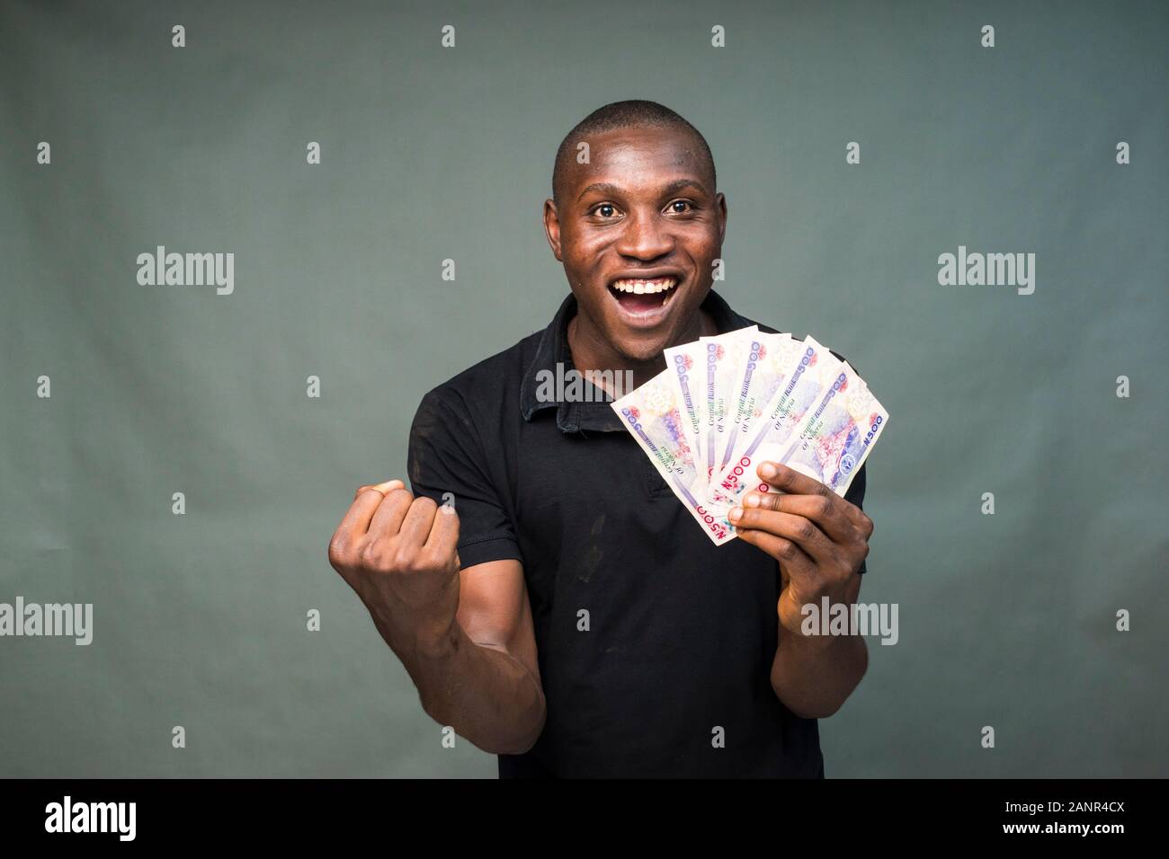 Black Man Holding Money