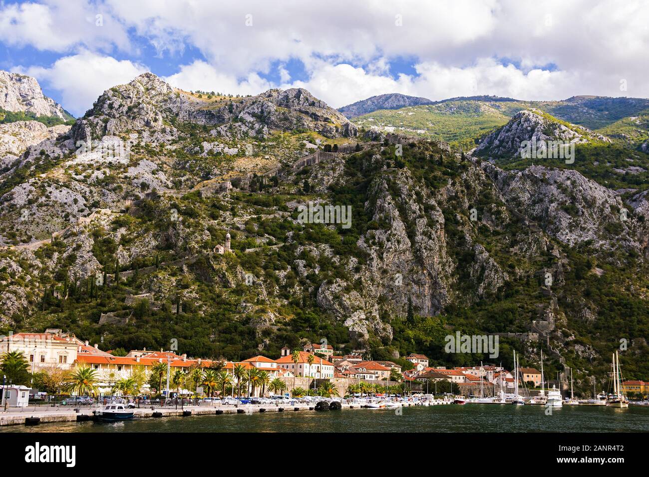 Ancient walls of Kotor Fort (St John Fortress) in the mountains slope ...