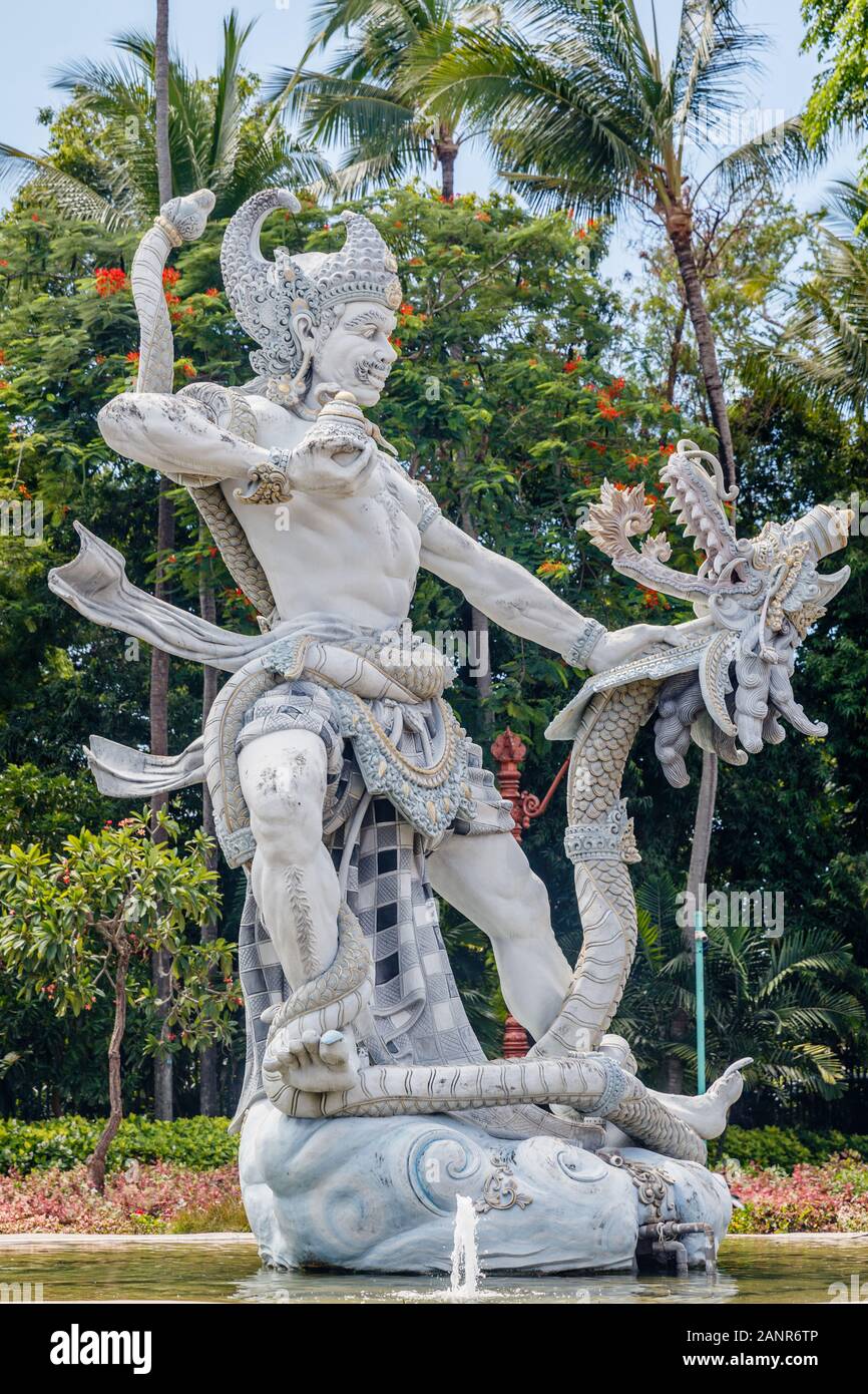 Statue of Arjuna fighting the dragon, character of the Pandavas from ...