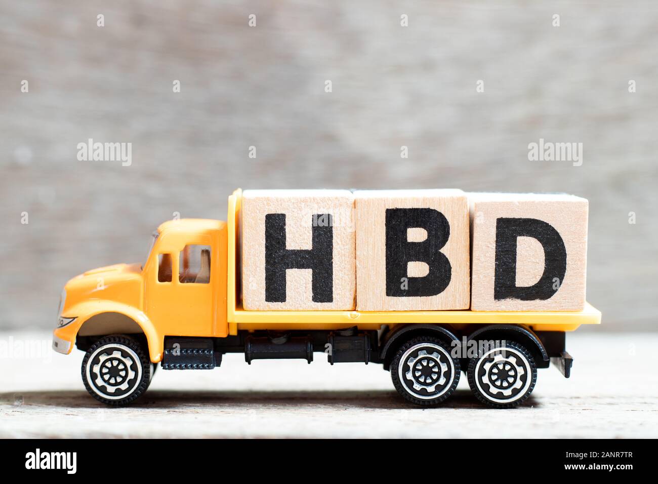 Truck hold letter block in word HBD (abbreviation of happy birthday) on ...