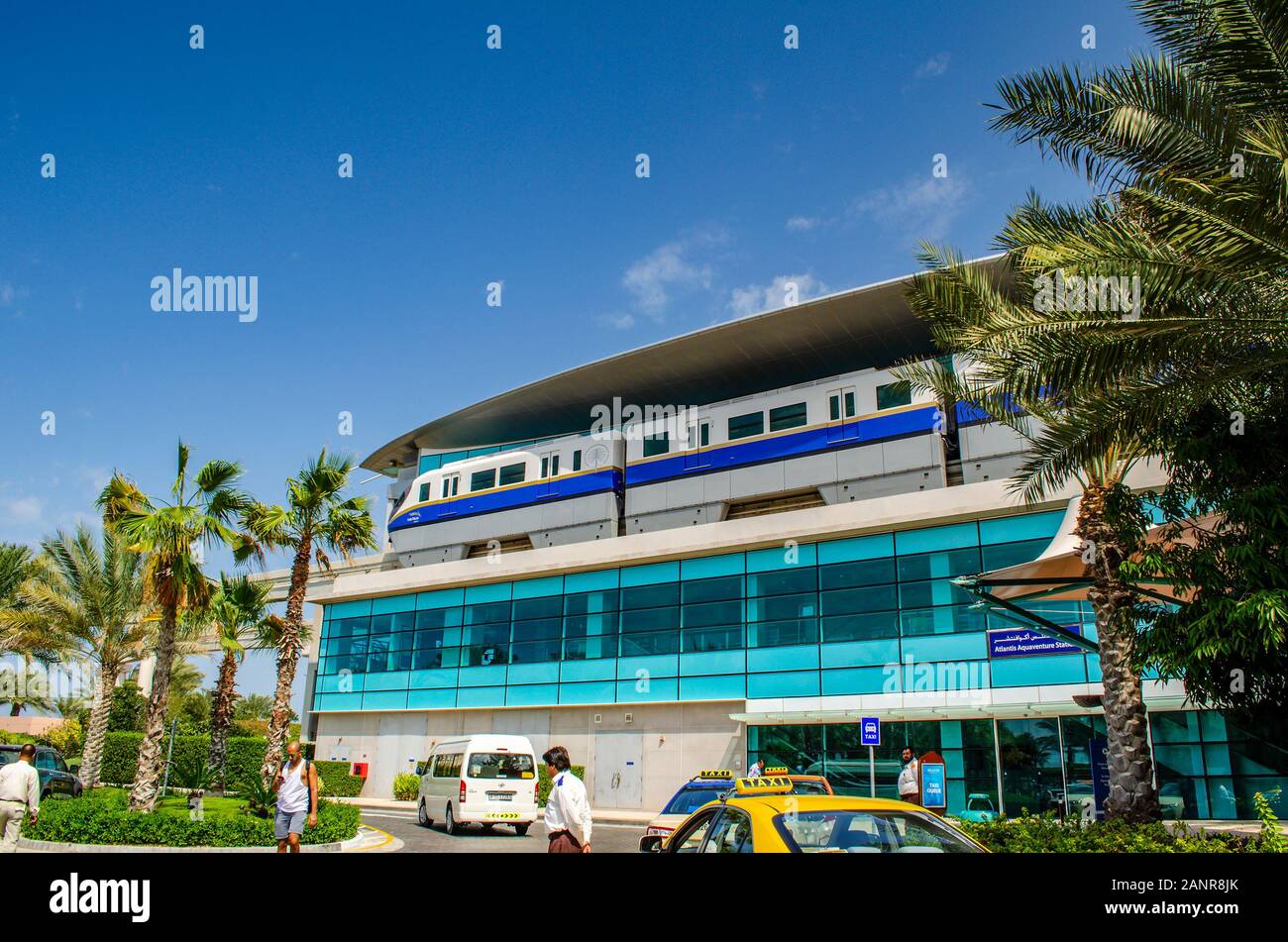 Train arriving at Atlantis Monorail station in Dubai. Scenic view from ...