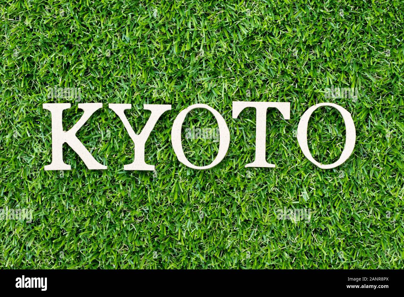 Wood alphabet letter in word Kyoto on green grass background Stock ...