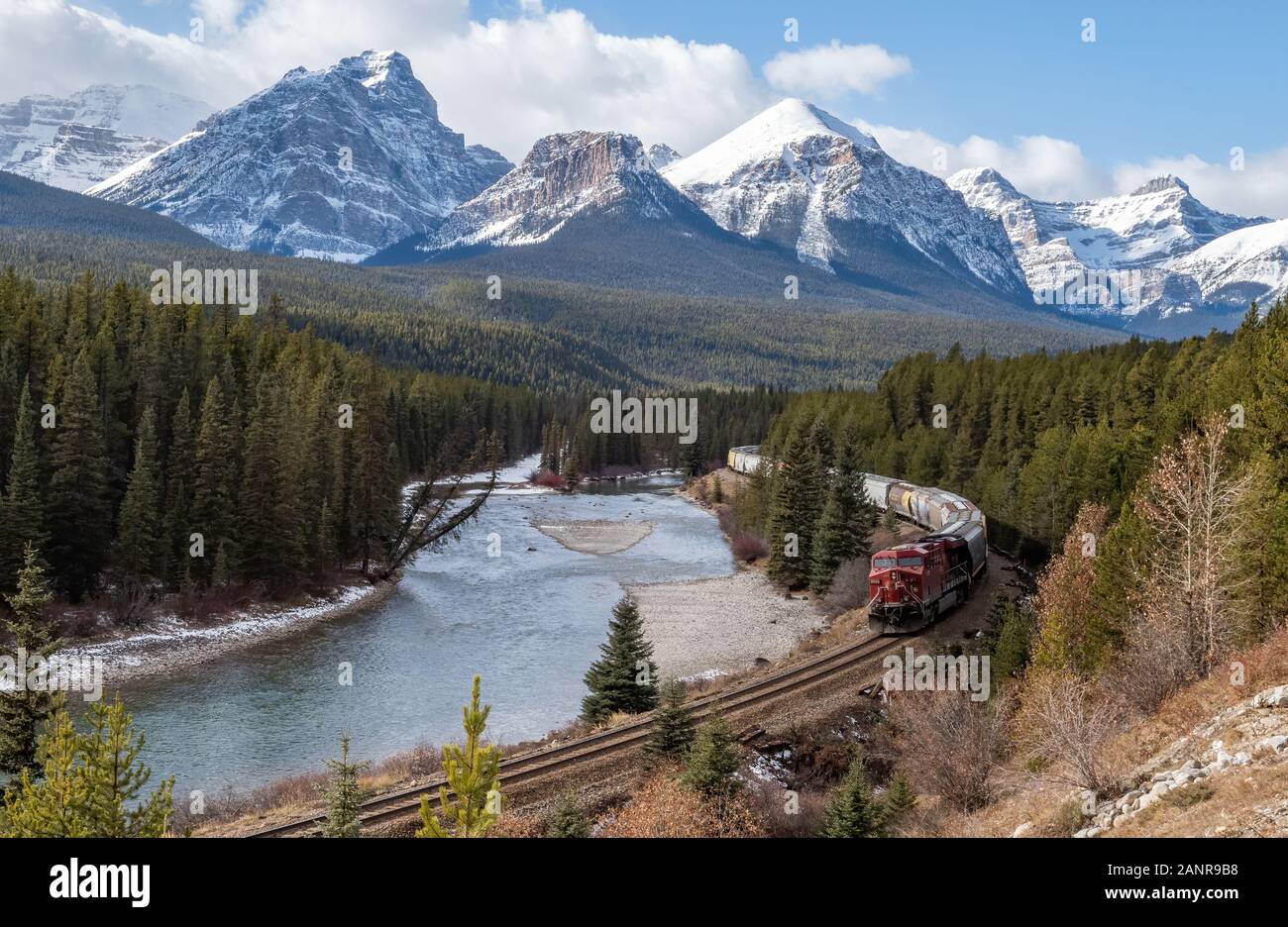 Train in a vally in Banff National Park Canada Stock Photo - Alamy