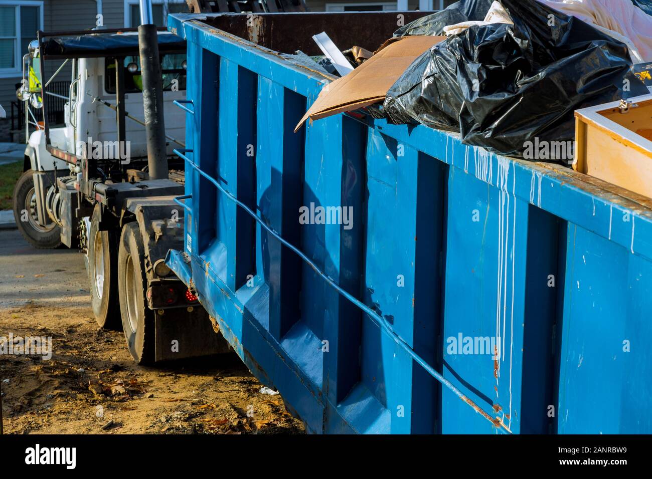 Loading the garbage container construction material and used in the ...