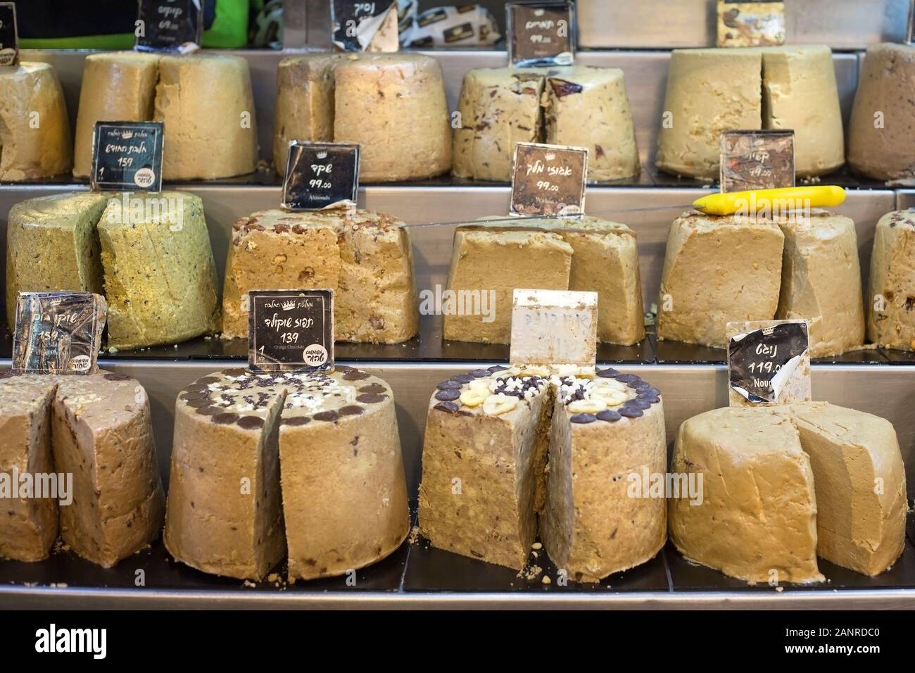Wheels of halva, a sweet sesame dessert, on display in Jerusalem's ...
