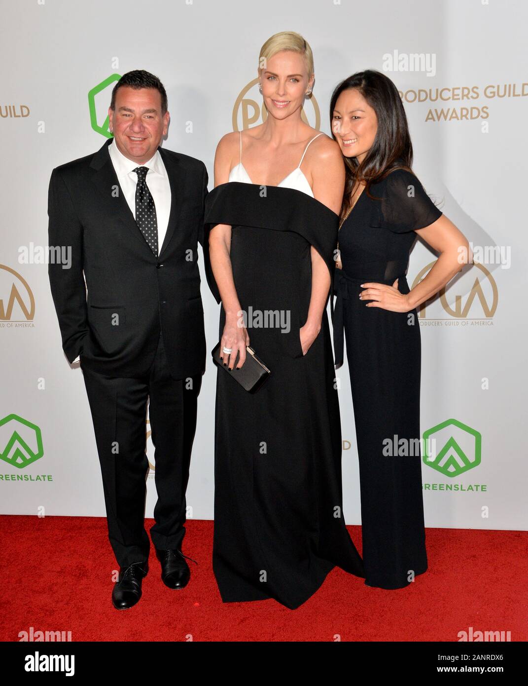 Los Angeles, USA. 18th Jan, 2020. A.J. Dix, Charlize Theron & Beth Kono ...