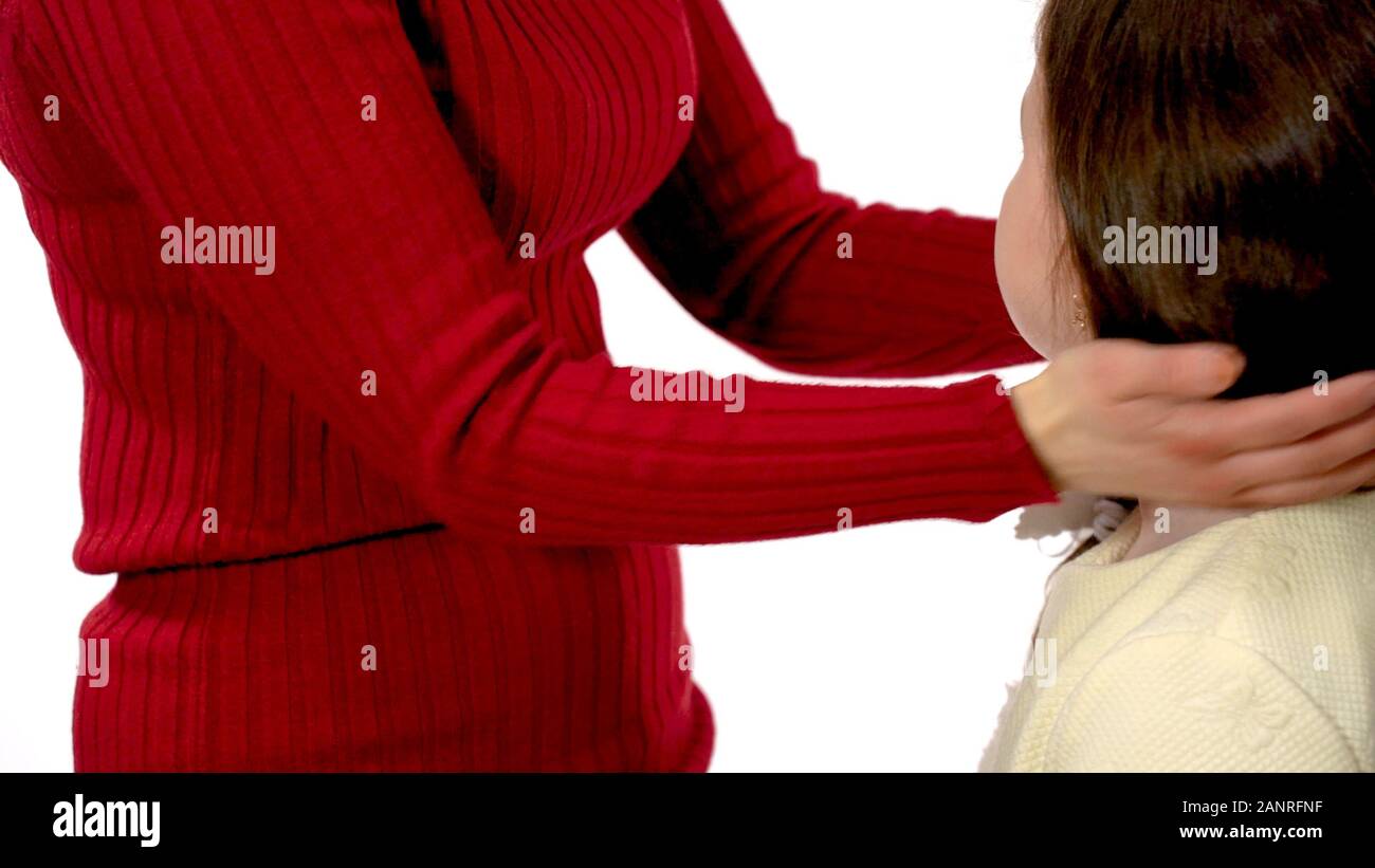 Caring mother embracing the child with her hands, mother and baby ...