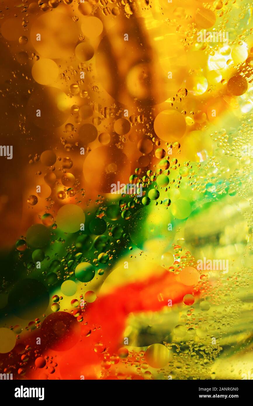 colorful cooking oil bubbles in water.abstract mosaic tiles textured ...