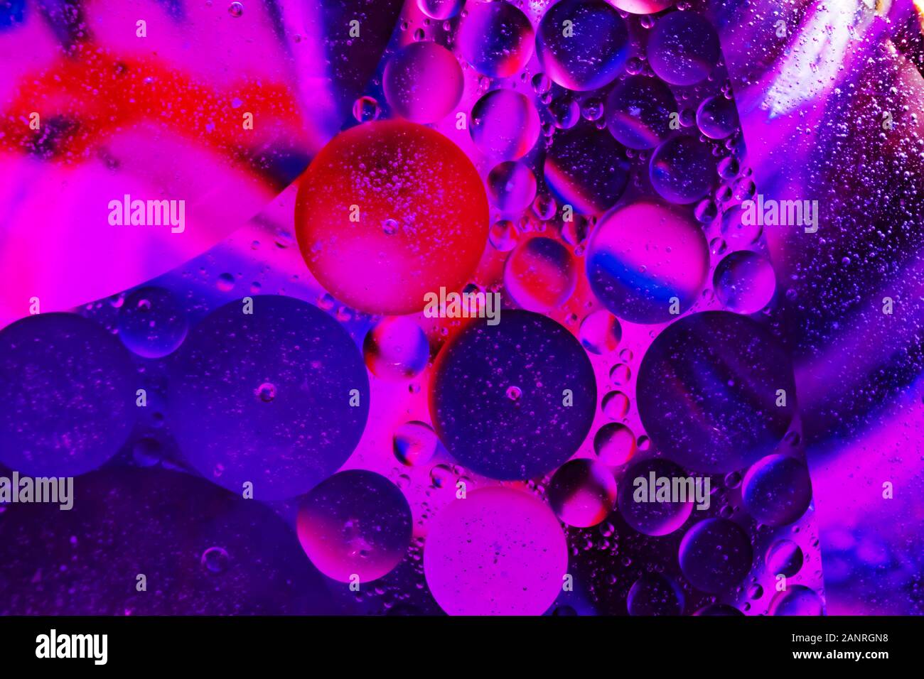 colorful cooking oil bubbles in water.abstract mosaic tiles textured ...