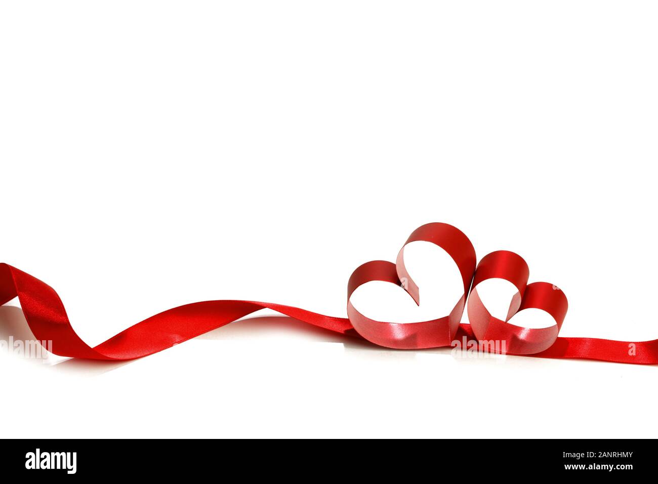 Red heart shaped ribbon isolated on white background Valentines day ...
