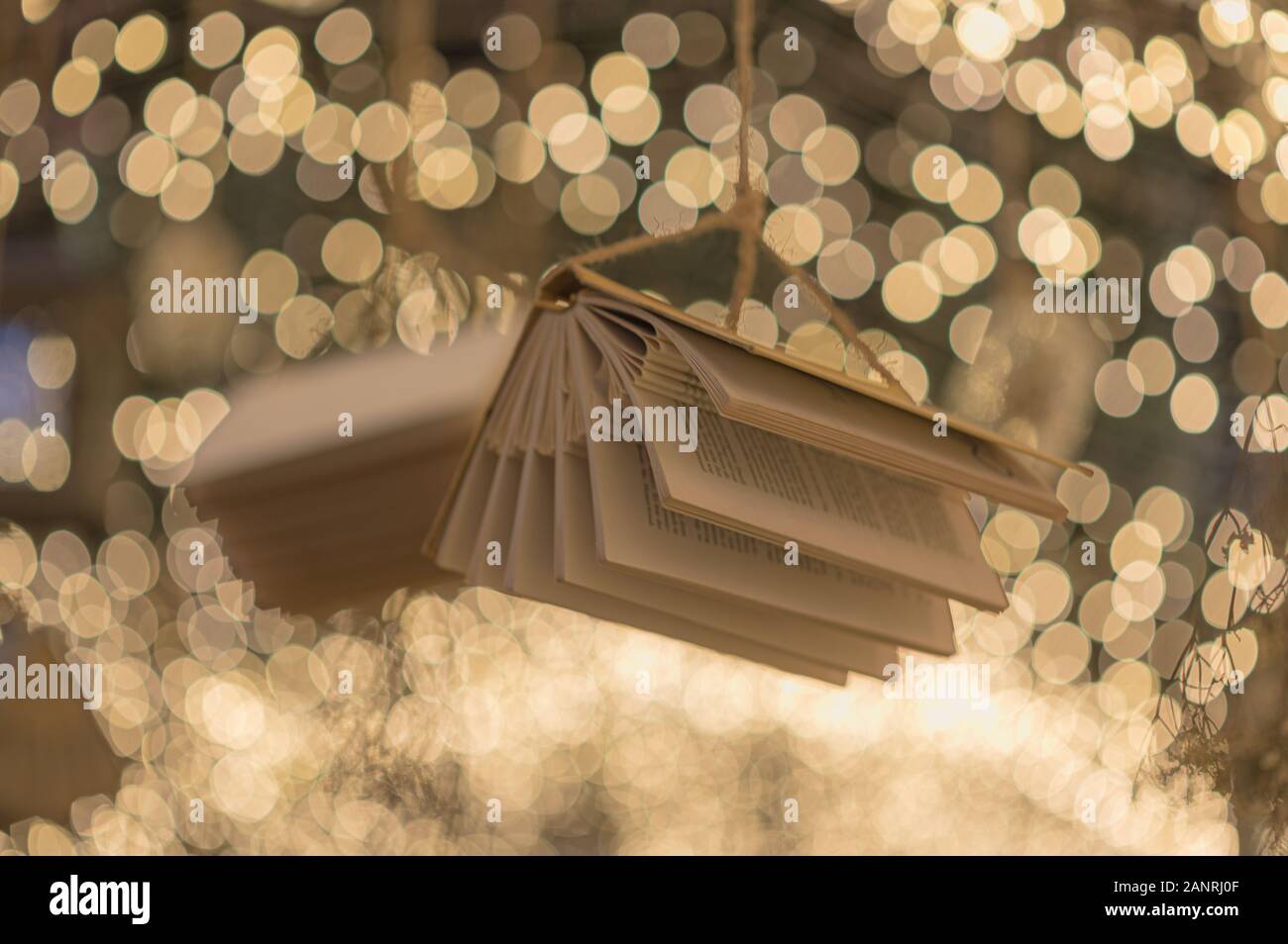 Blurred bokeh and old books background Stock Photo - Alamy