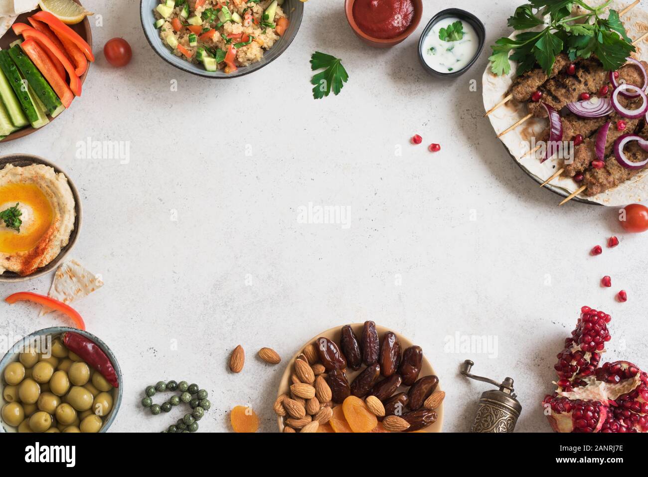 Arabic and Middle Eastern food, dinner table. Meat kebab, hummus ...