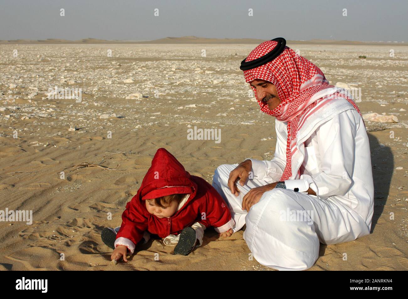 Qatari man with his kid hi-res stock photography and images - Alamy