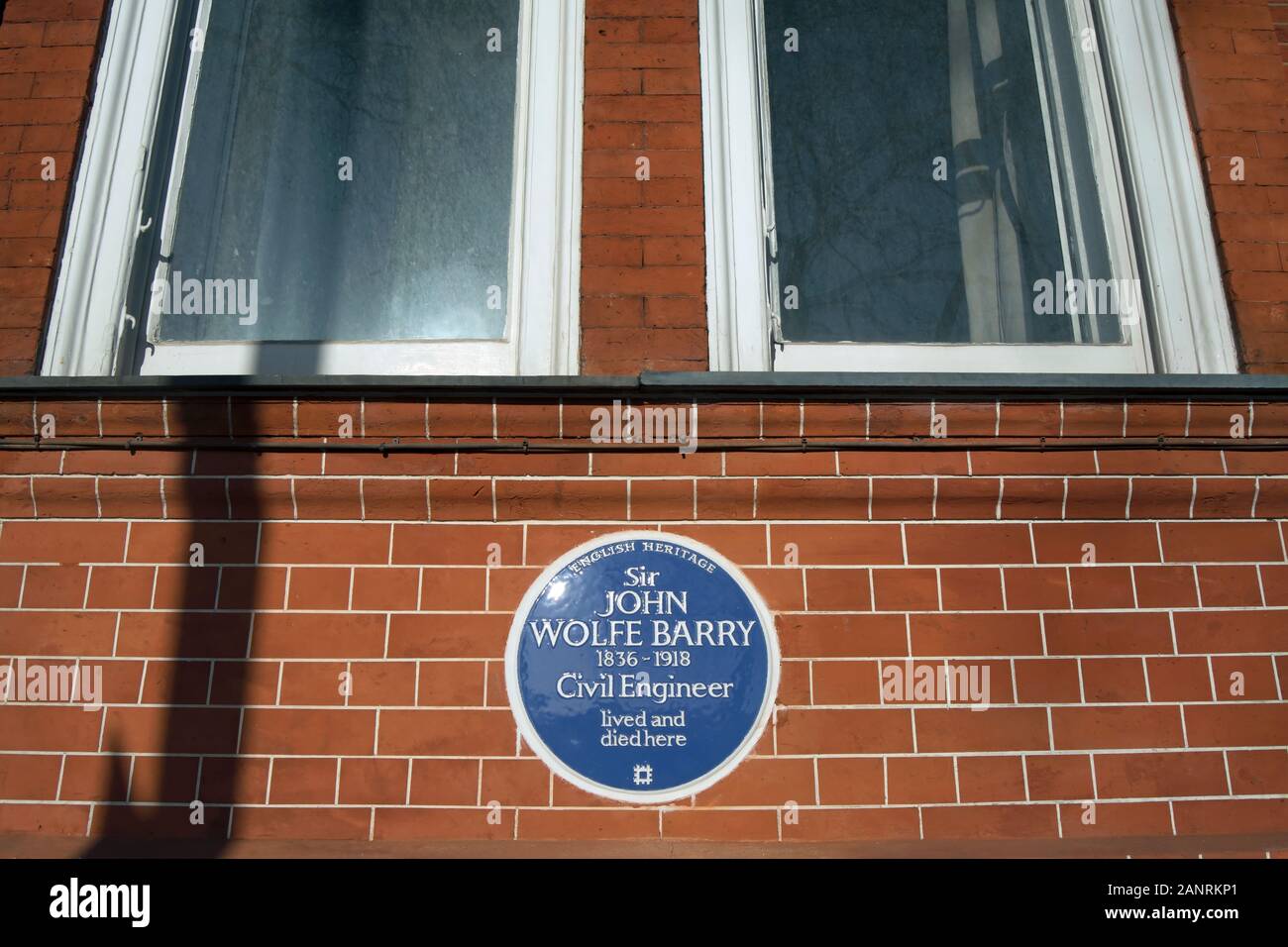 english heritage blue plaque marking a home of civil engineer sir john ...