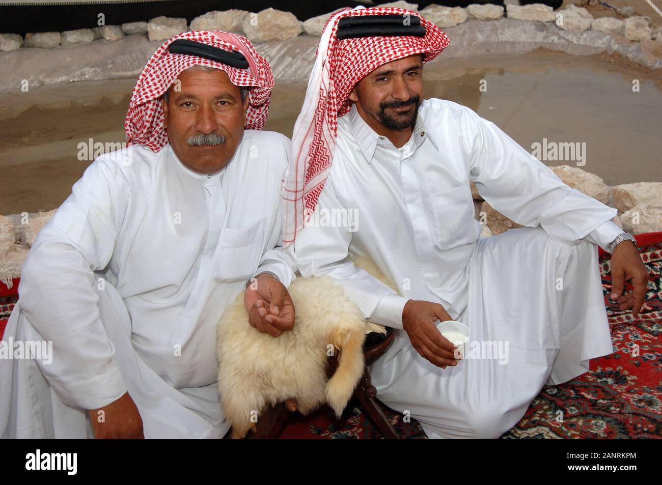 Traditions, arabic culture, portrait of two qatari men drinking tea ...