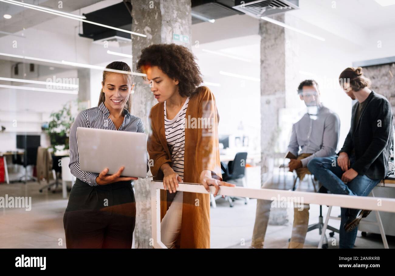 Software engineers working on project and programming in company Stock ...