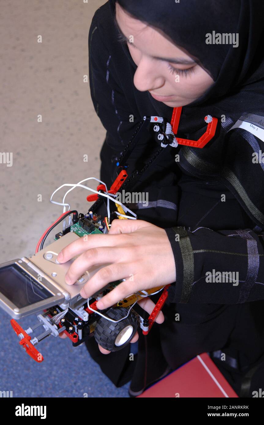 Qatar Foundation University. Qatari woman Student building a robot for ...