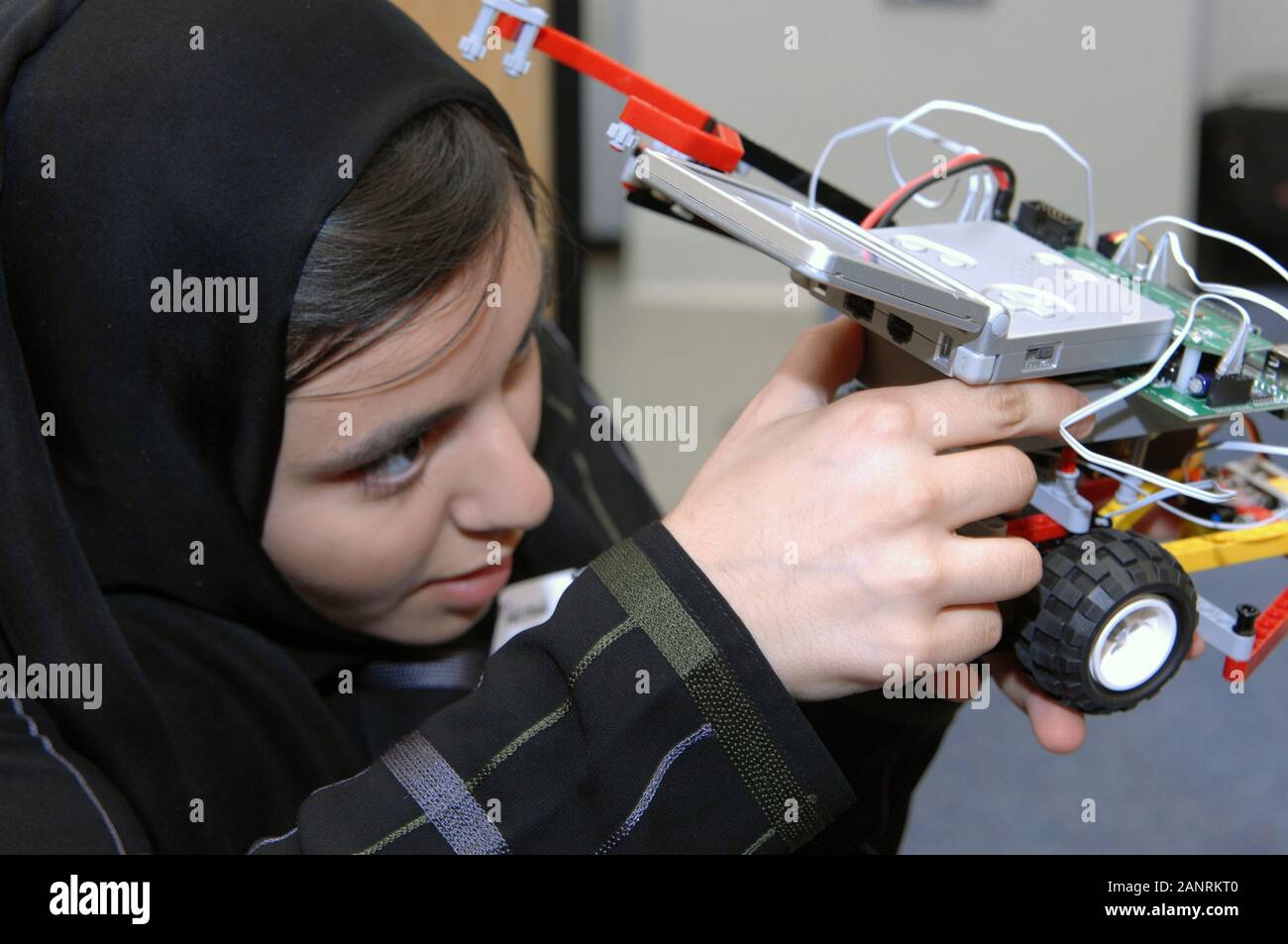 Qatar Foundation University. Qatari woman Student building a robot for ...