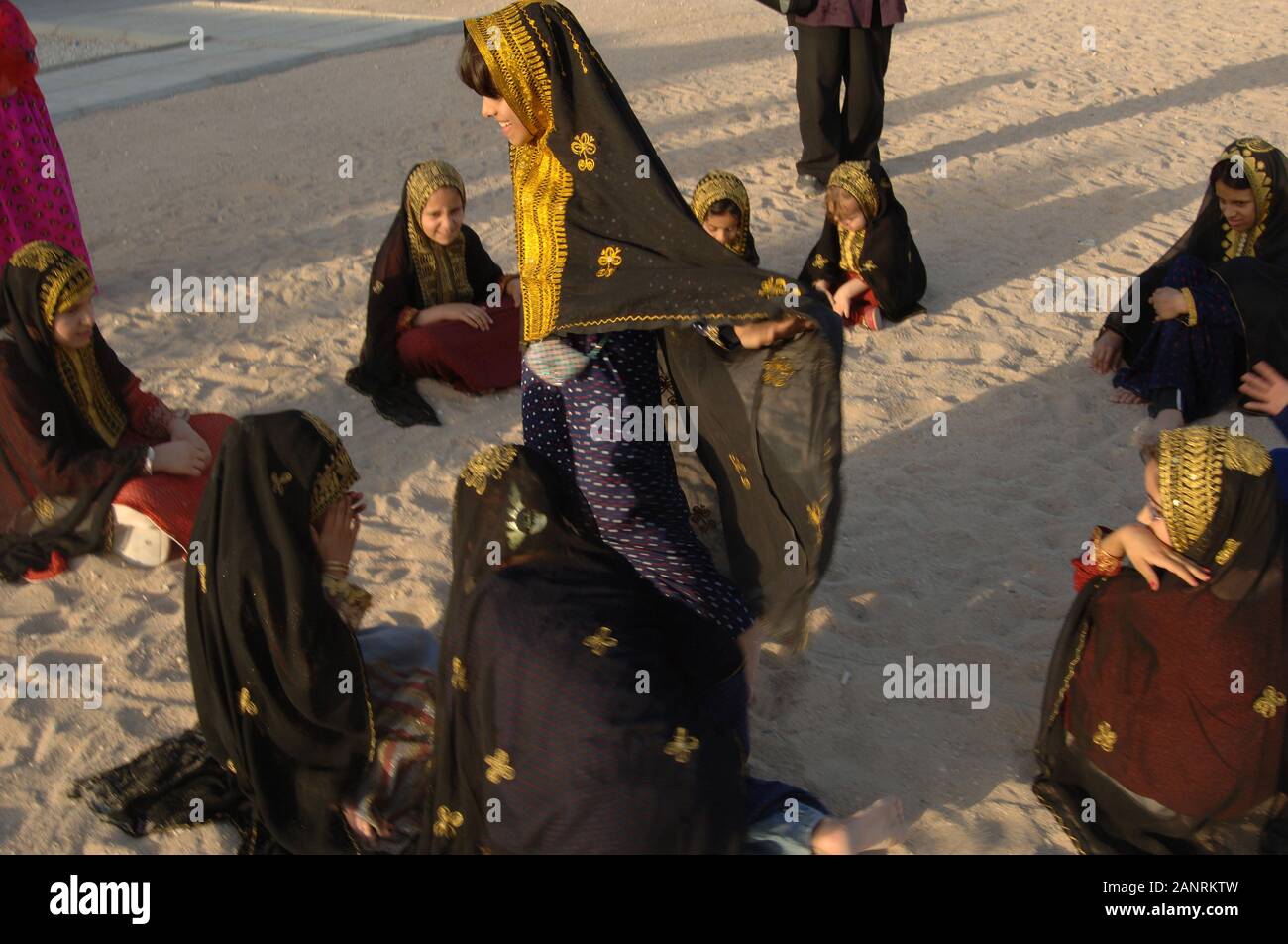 Cultural Festival, group of qatari girls in traditional dress playing ...