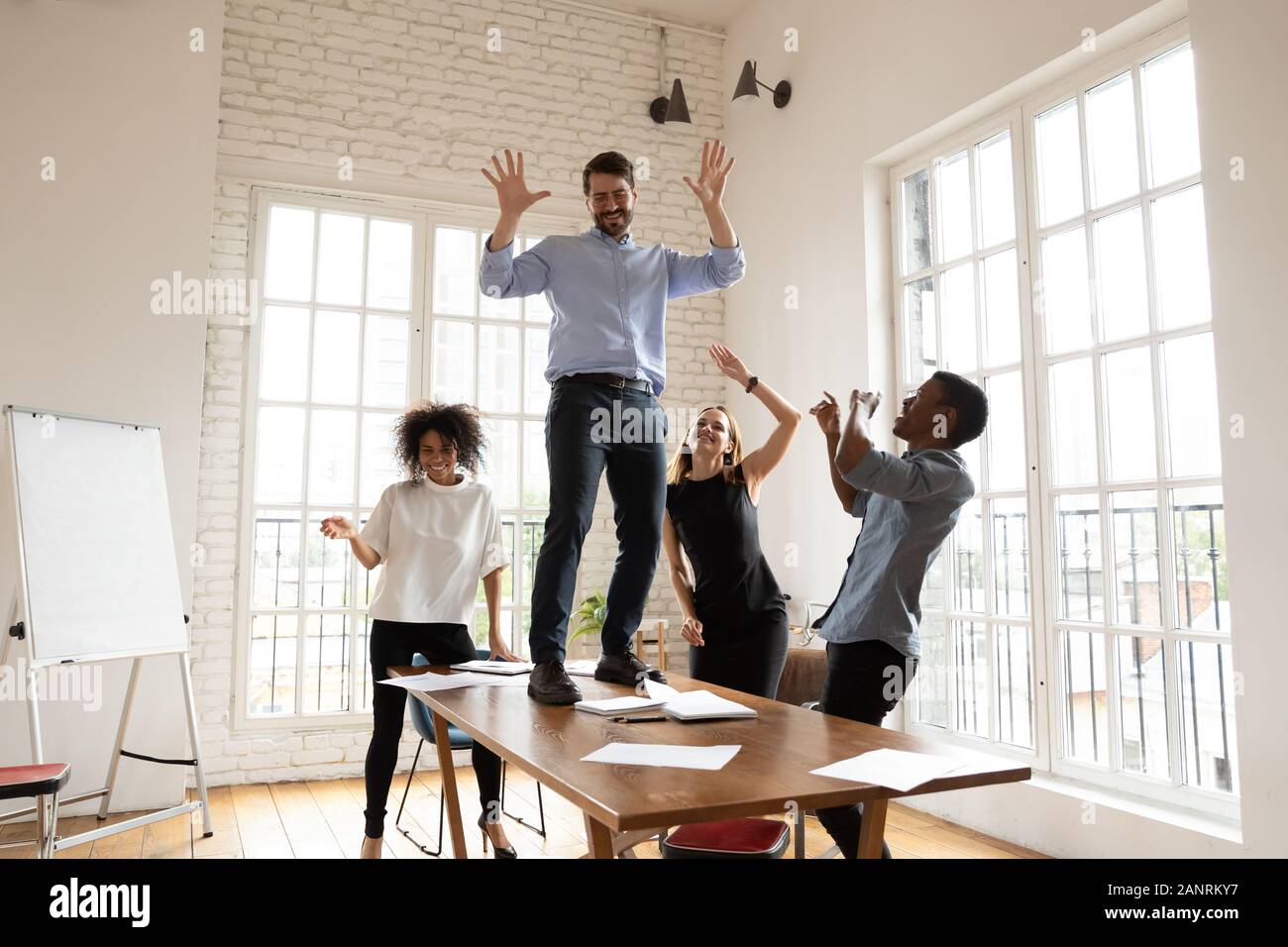 Excited business woman dancing hi-res stock photography and images - Alamy