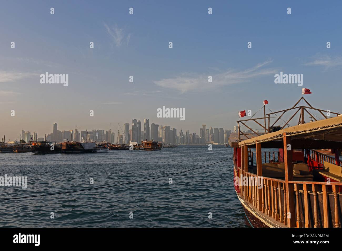 Corniche view with Dhows and skyscrapers Stock Photo - Alamy