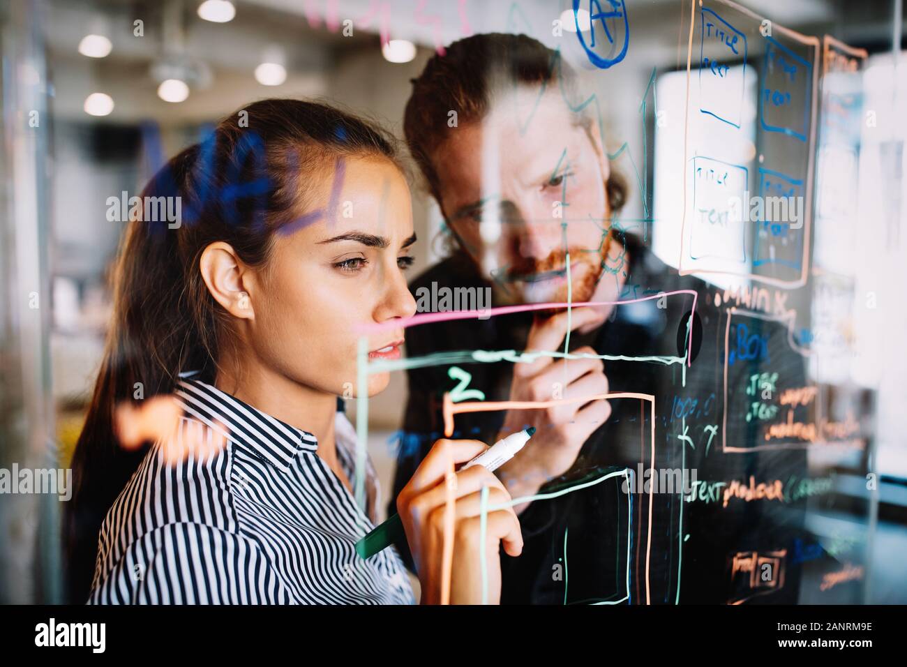 Programmer working in a software developing company Stock Photo - Alamy