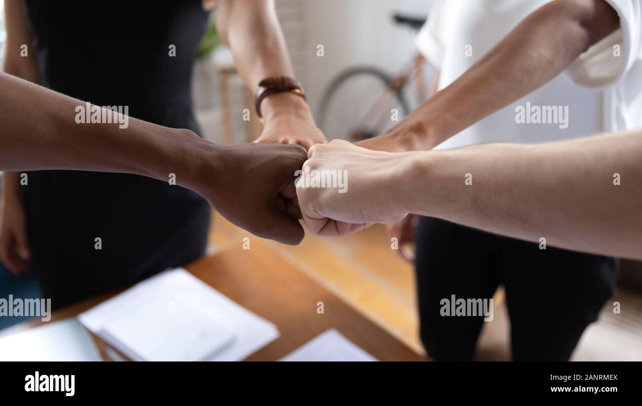Black hands fist bump circle hi-res stock photography and images - Alamy