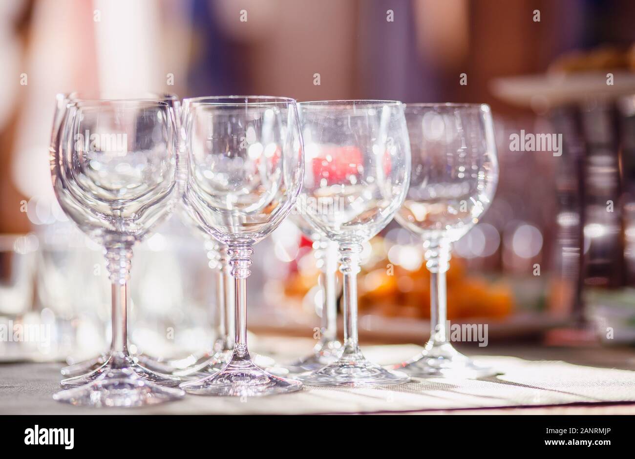 Catering service. Table setting, glass goblets, cutlery Stock Photo - Alamy