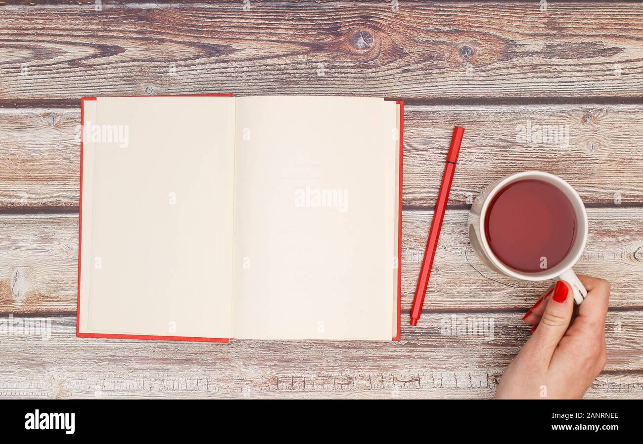 Red cup on book hi-res stock photography and images - Alamy