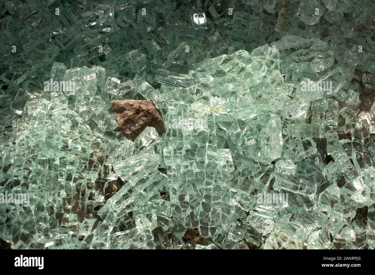 Broken glass is scattered a lot. Glass shards Stock Photo - Alamy