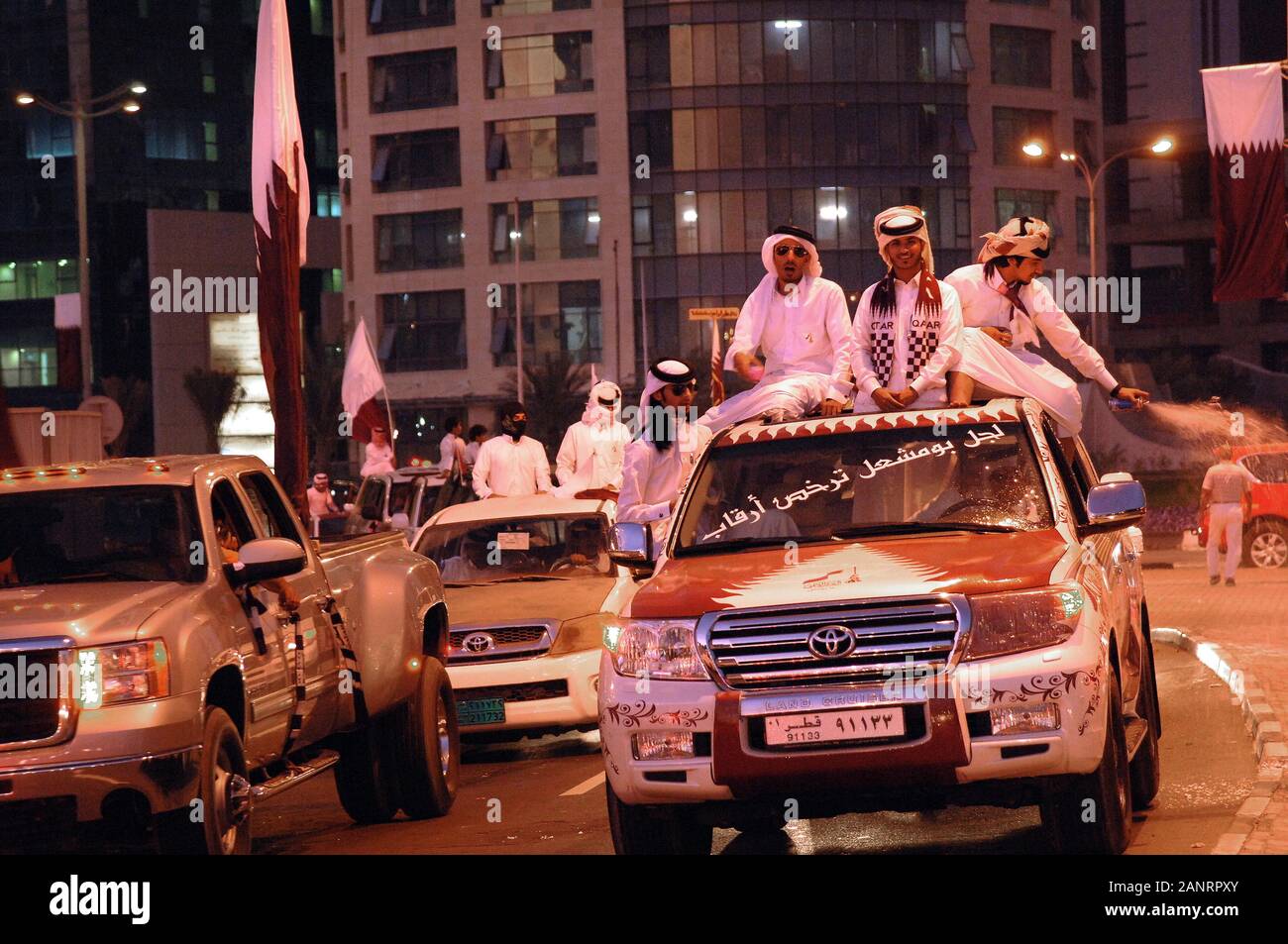 Doha, Qatar- National Day, Qatari cars celebration at night along the ...