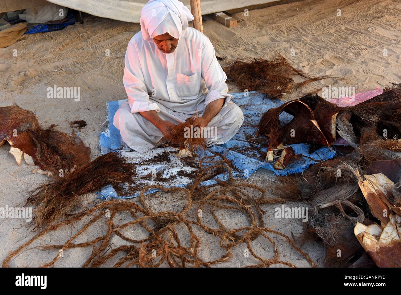 Craftsman making ropes, Katara Traditional Dhow Festival, Doha, Qatar ...