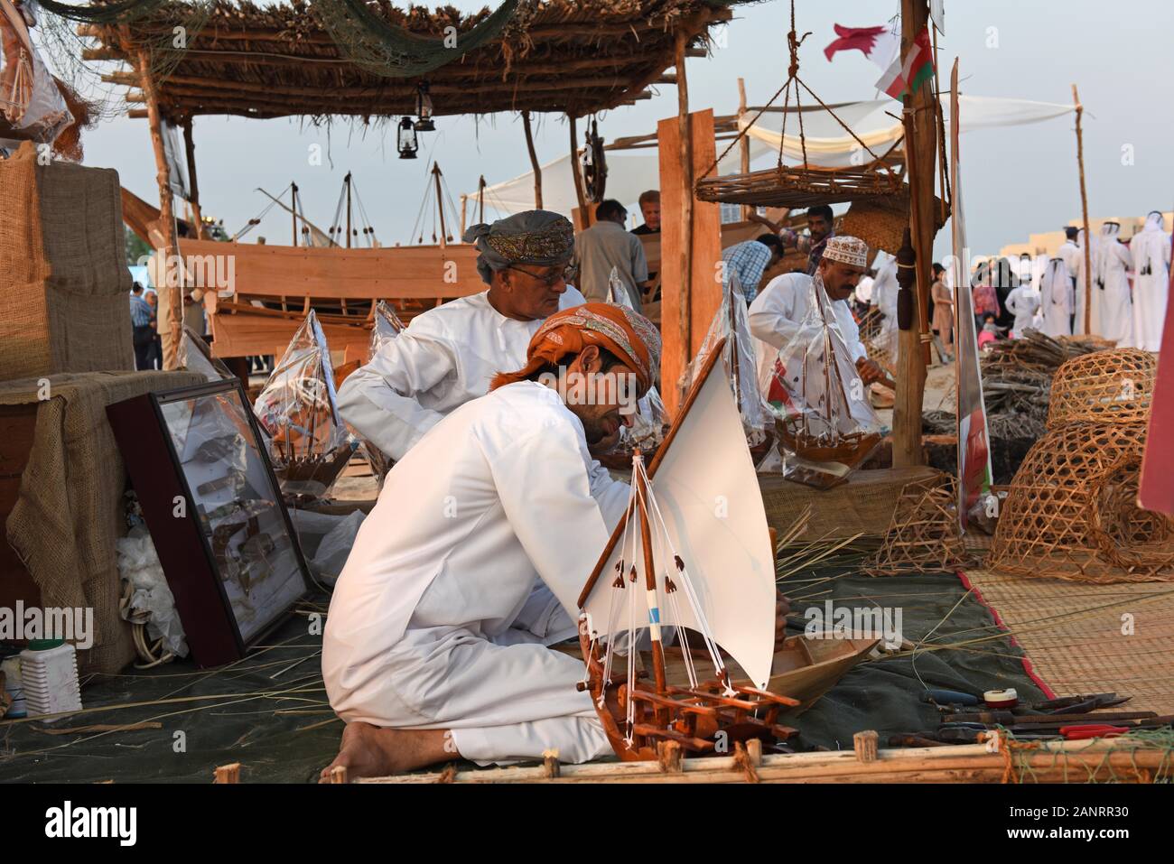 Craftsman building a small Dhow on the beach, Katara Traditional Dhow ...