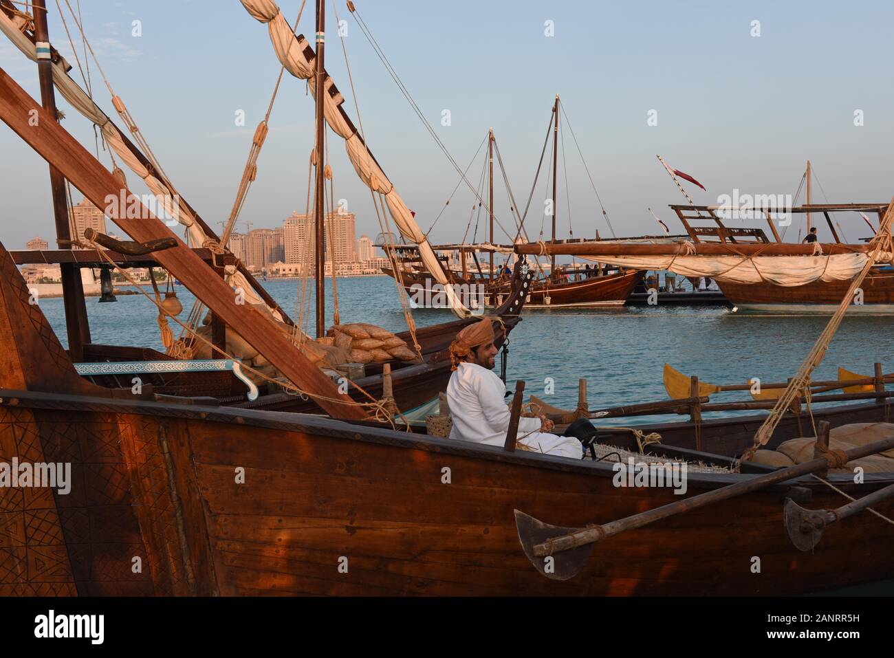Men sitting on the Dhow, Katara Traditional Dhow Festival, Doha, Qatar ...