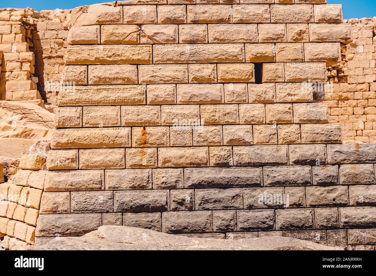 Ancient stone military fort Malta island made of brick rocks on shore ...