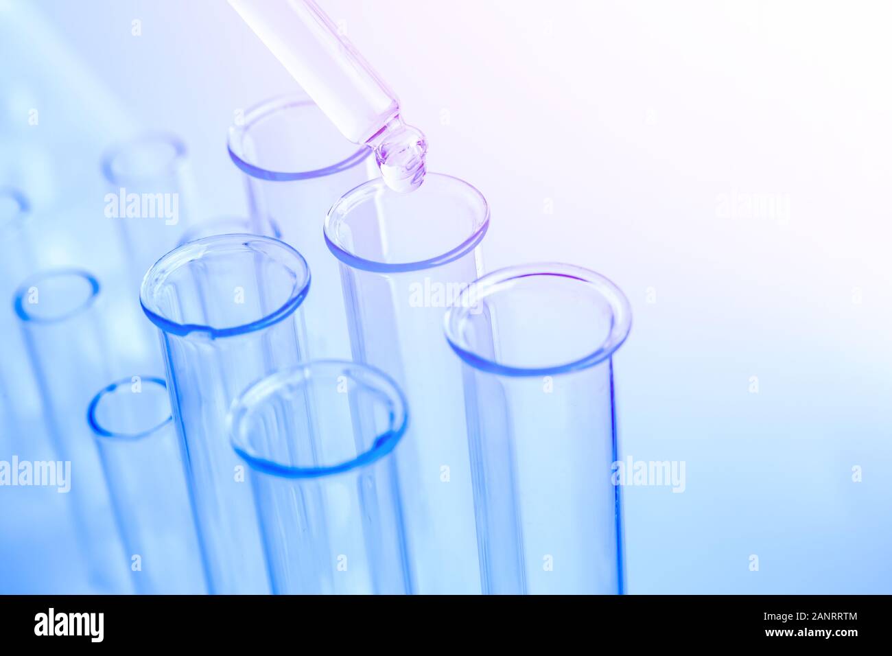 Science laboratory test blue tubes, macro flask equipment. Chemical ...