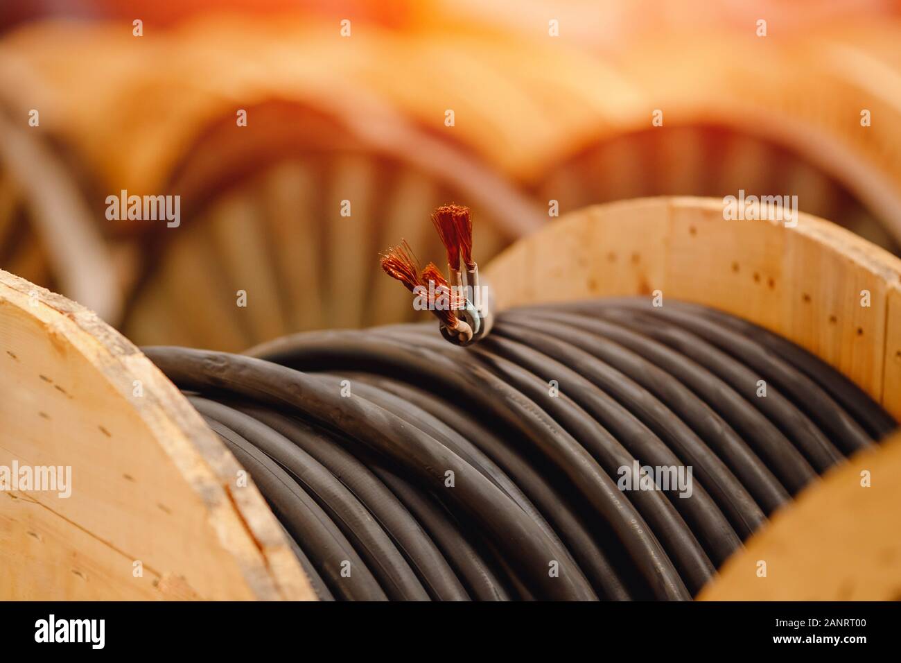 Production of copper wire, bronze cable in reels at factory Stock Photo ...