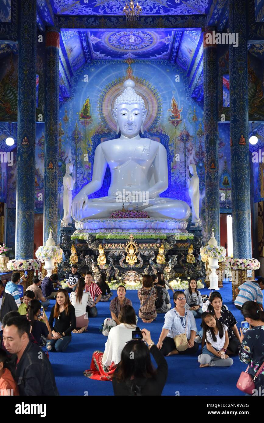 Wat Rong Seur Ten, also known as the Blue Temple, with visitors having ...