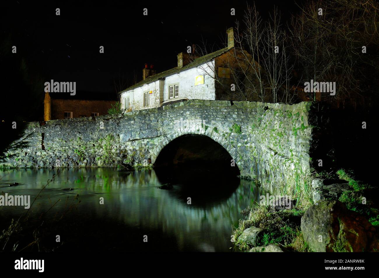 A road bridge that crosses over Malham Beck to connect the East & West ...