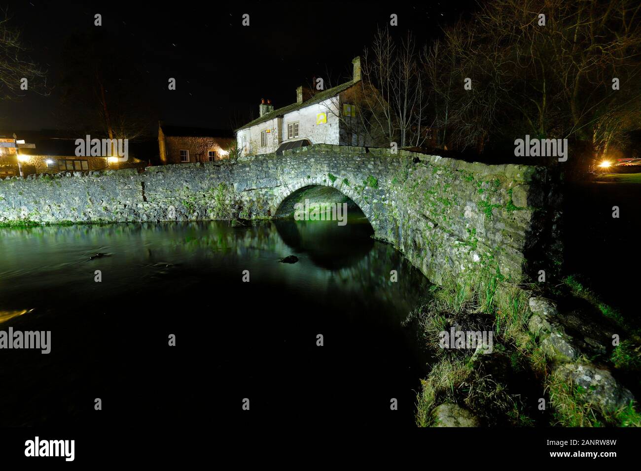 A road bridge that crosses over Malham Beck to connect the East & West ...