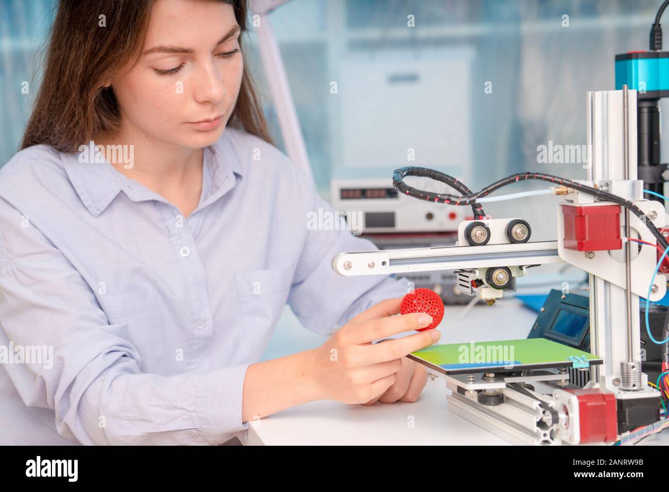 A student girl print prototype on 3D printer Stock Photo - Alamy