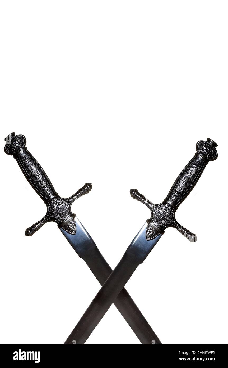 two crossed medieval sword, isolated Stock Photo - Alamy
