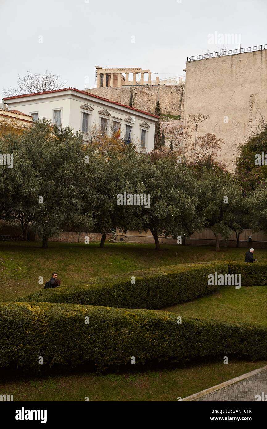 Athens garden and a view of acropolis from plaka Stock Photo - Alamy