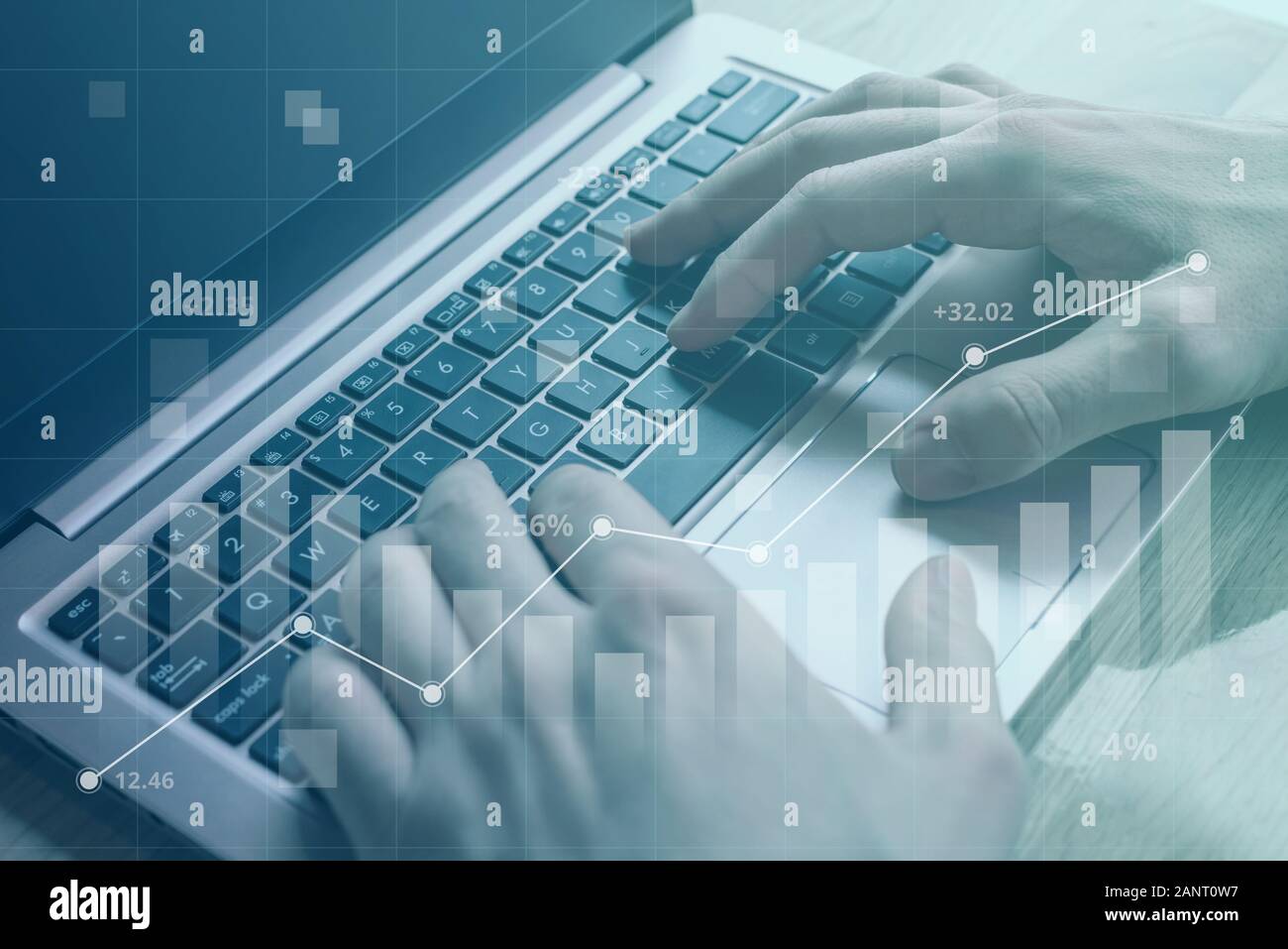 Economy, finance, business concept with hands on laptop computer ...